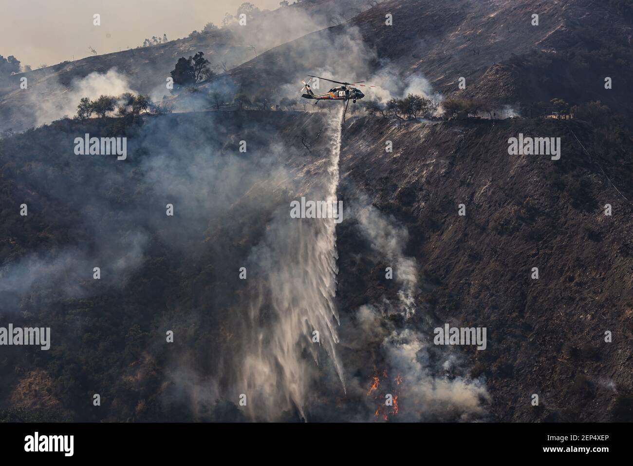 Getty Fire Burns in Los Angeles. A small brush fire burns in the hills ...