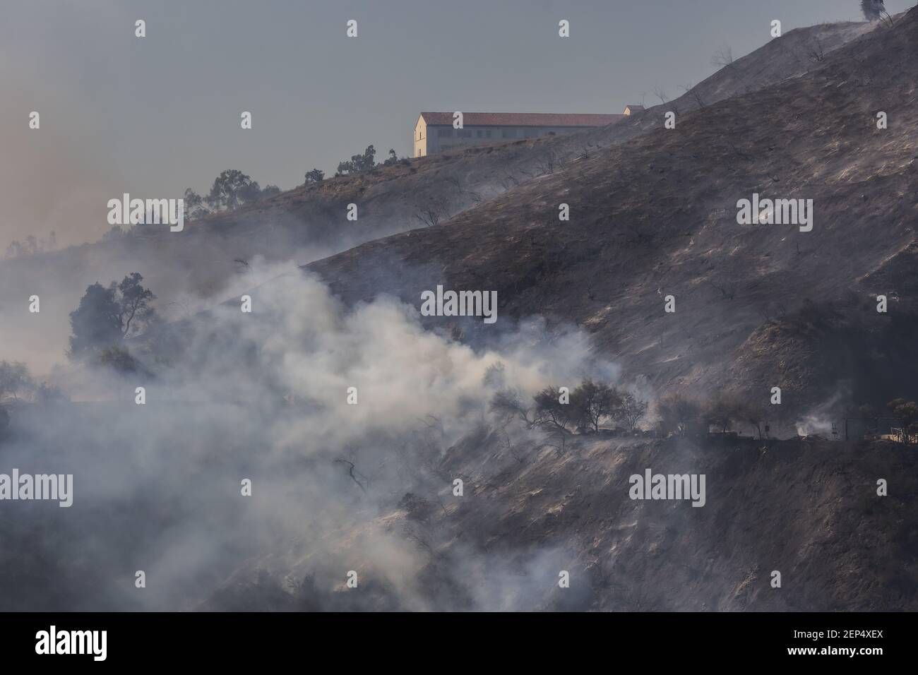 Getty Fire Burns in Los Angeles. A small brush fire burns in the hills ...