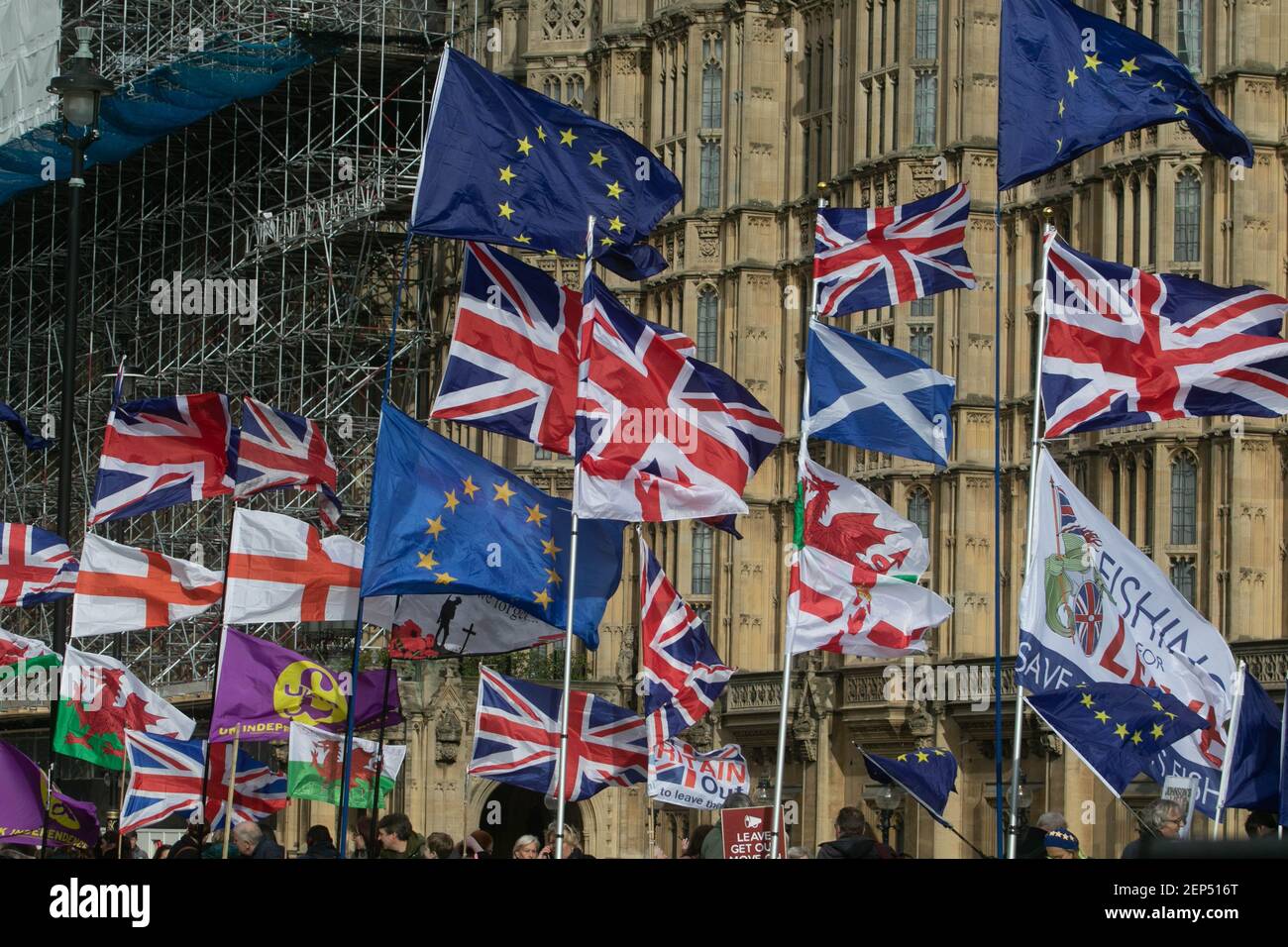 Various flags displayed outside Parliament by protesters. (Photo by ...