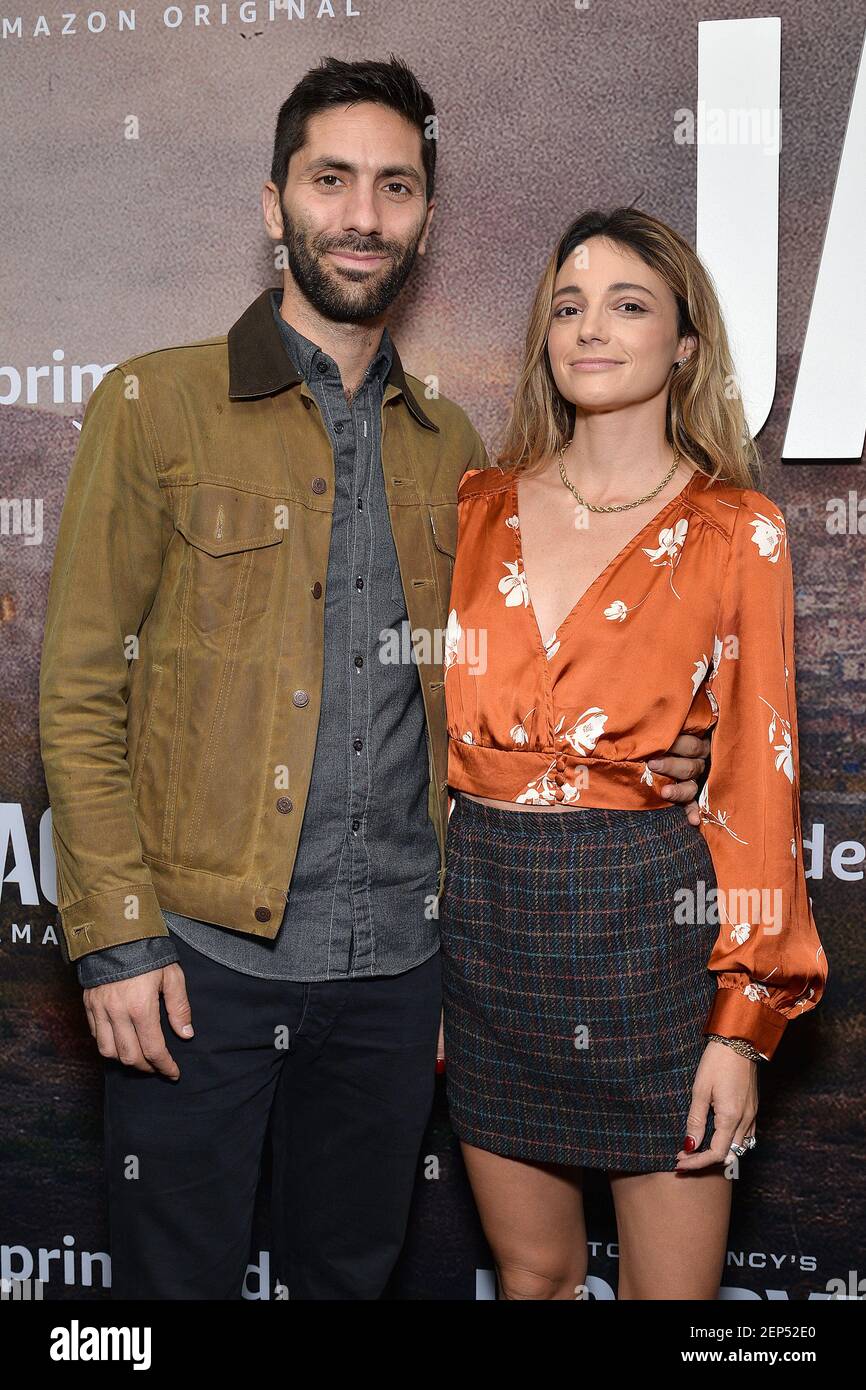 (L-R) Nev Schulman ad Laura Perlongo attend The Premiere of “Tom Clancy ...
