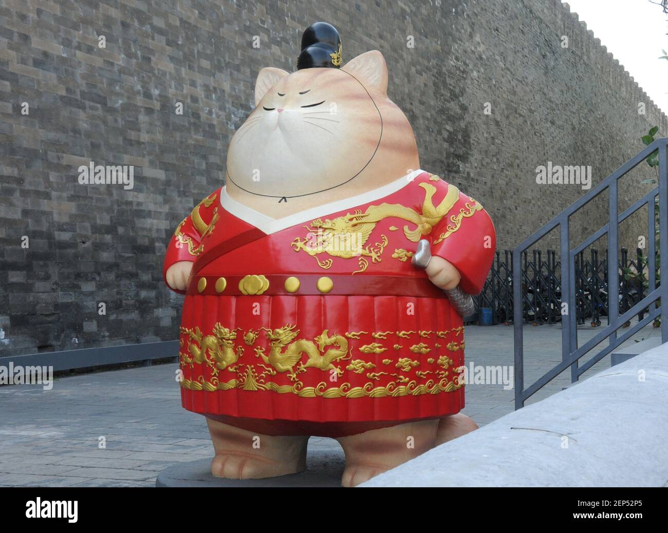 Beijing,CHINA-A giant "Royal cat" is seen near the palace wall outside ...