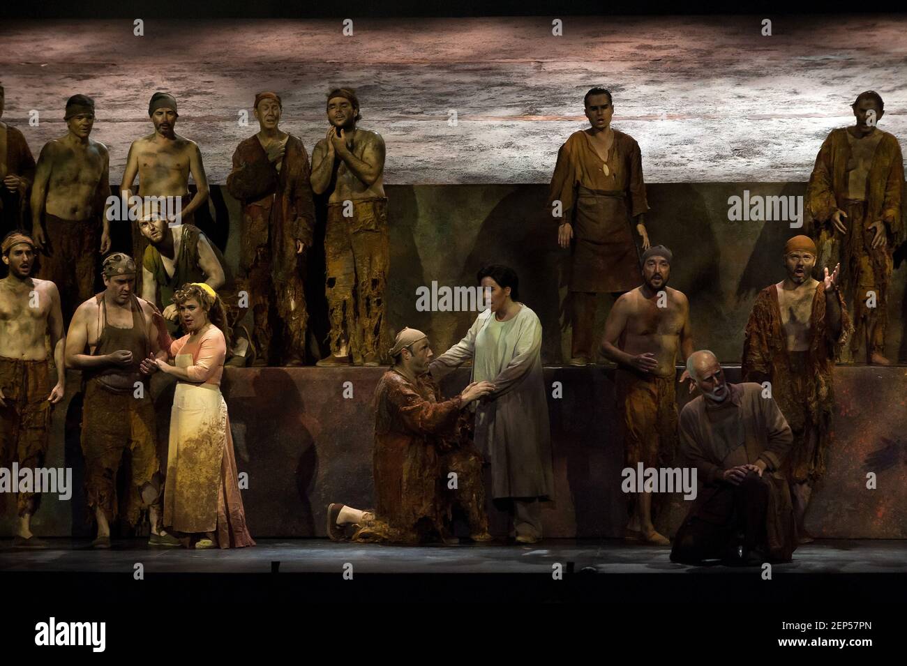 A group of cast members are seen singing on the stage as they take part ...