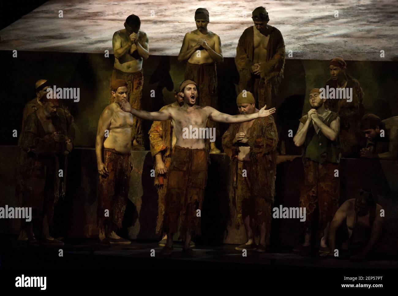 A group of cast members are seen singing on the stage as they take part ...