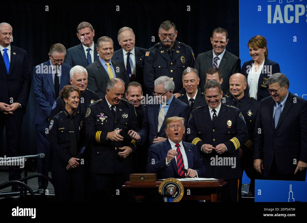 President Donald J. Trump signs an executive order establishing a new ...