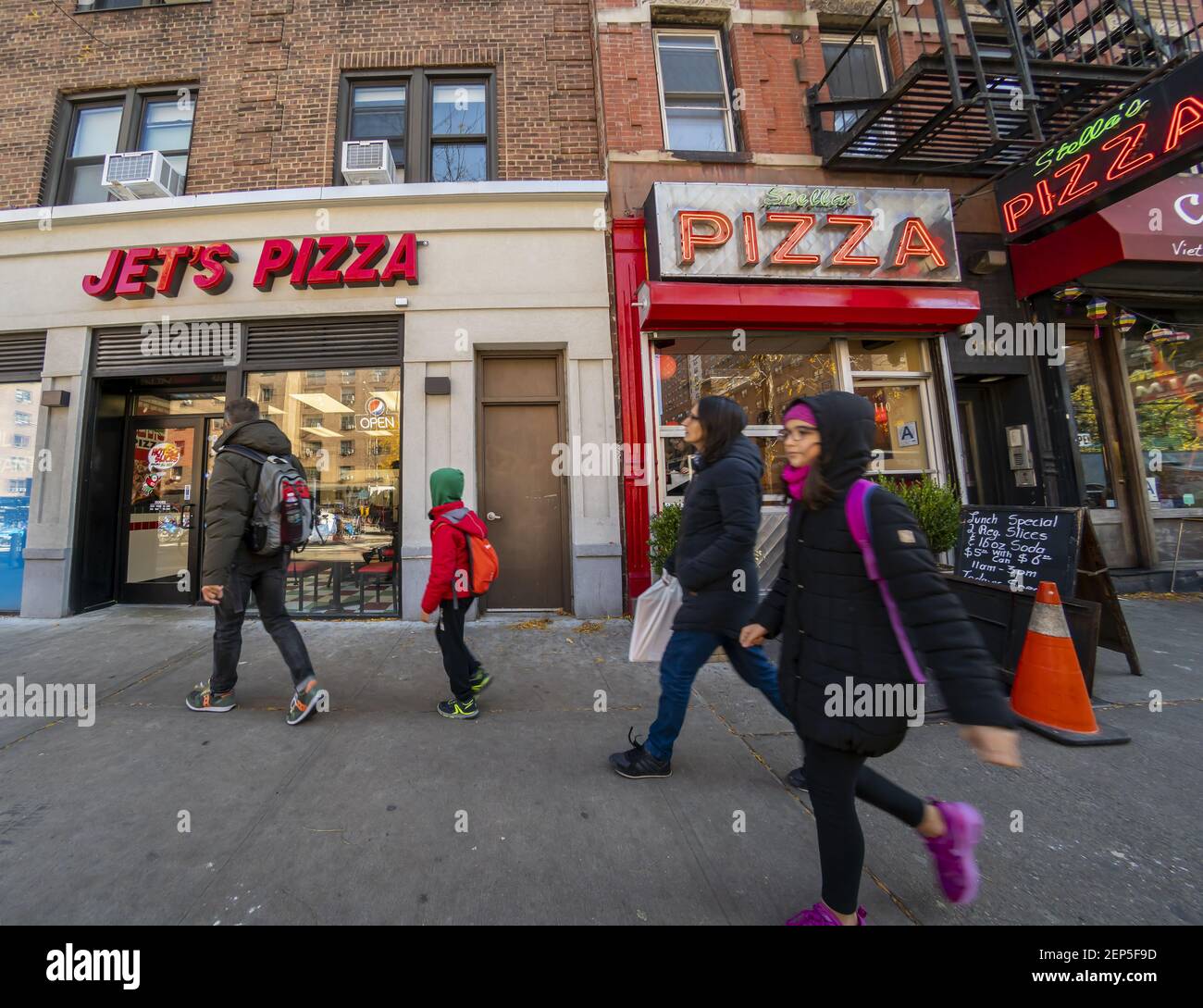 A franchise of Jetâ€™s Pizza and Stellaâ€™s Pizza compete next to each ...