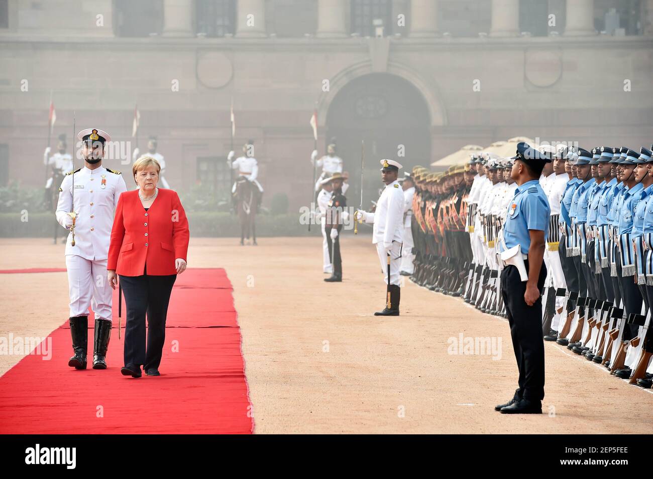 NEW DELHI, INDIA - NOVEMBER 1: German Chancellor Angela Merkel inspects ...