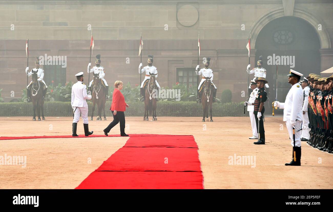 NEW DELHI, INDIA - NOVEMBER 1: German Chancellor Angela Merkel inspects ...