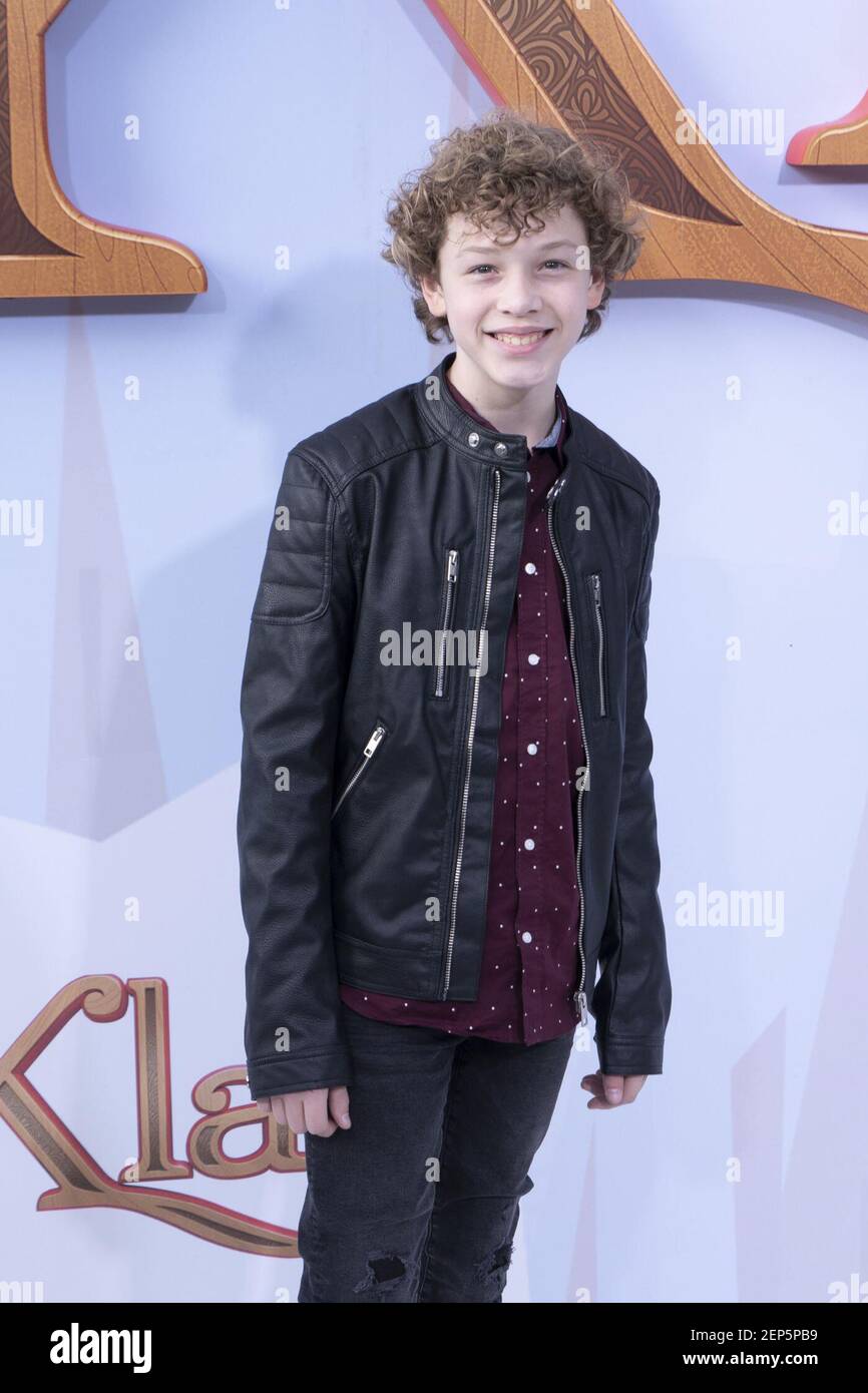 Tucker Meek walking the red carpet for the premiere of Klaus held at ...