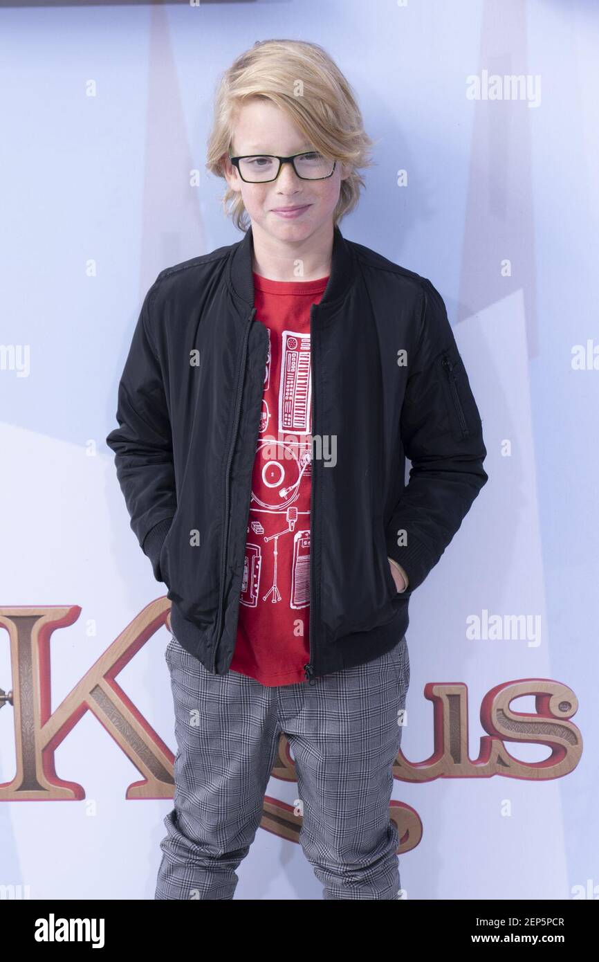 Evan Agos walking the red carpet for the premiere of Klaus held at the Regency Bruin Theater in ...