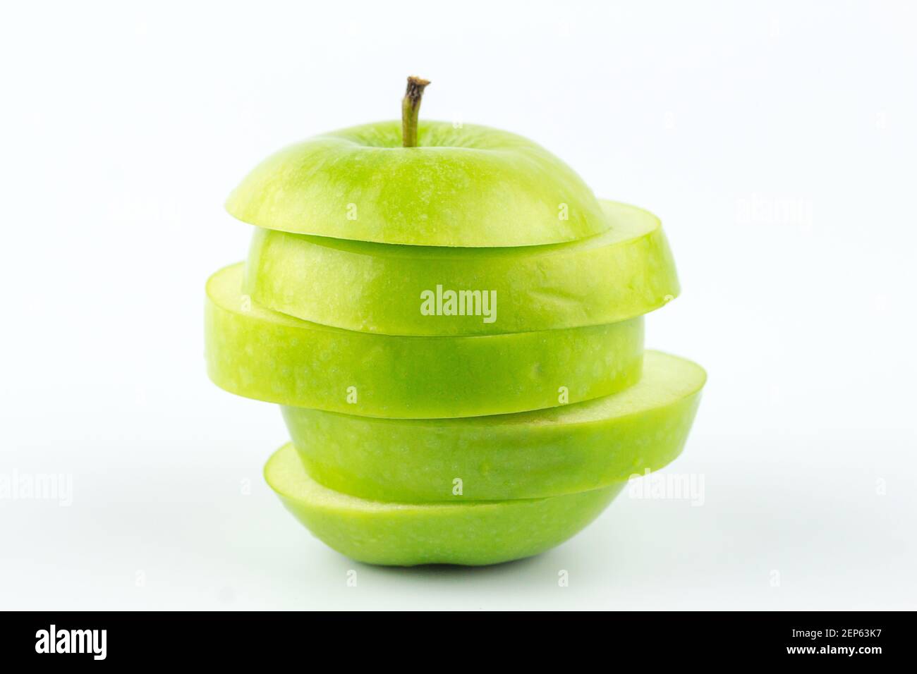 Close up green apple sliced isolated on white background Stock Photo ...