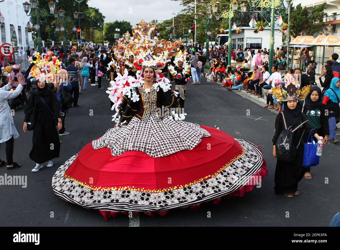 An artist uses Javanese traditional clothes during The Jogja Fashion ...