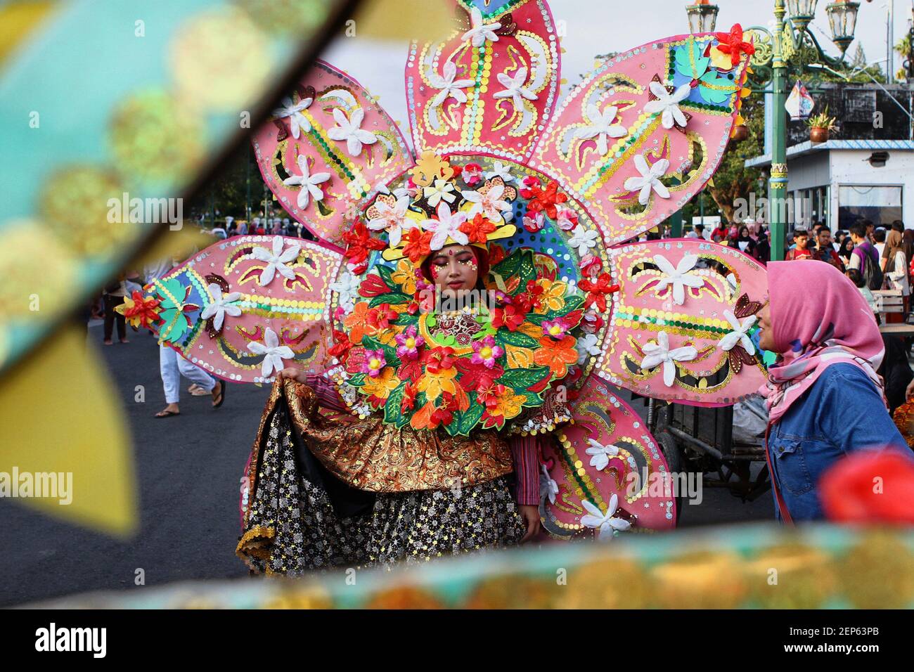 An artist uses Javanese traditional clothes during The Jogja Fashion ...