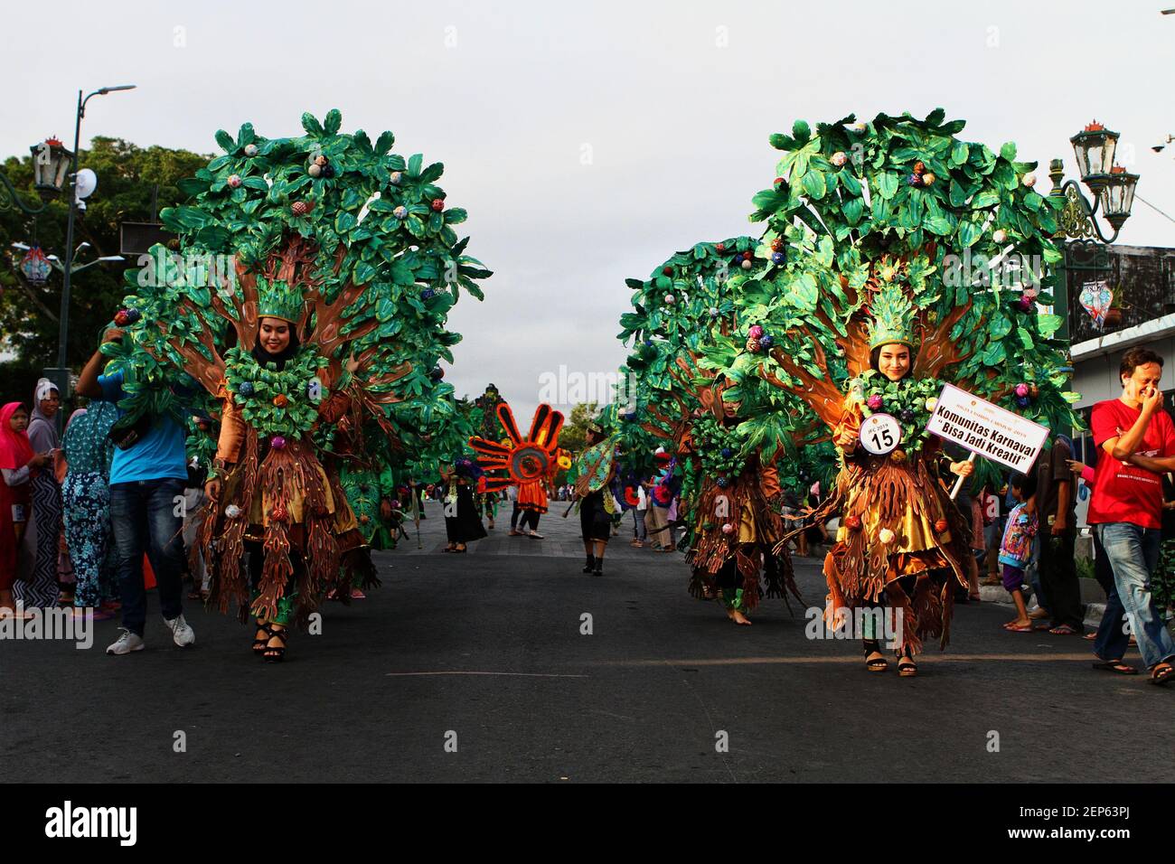 An artist uses Javanese traditional clothes during The Jogja Fashion ...