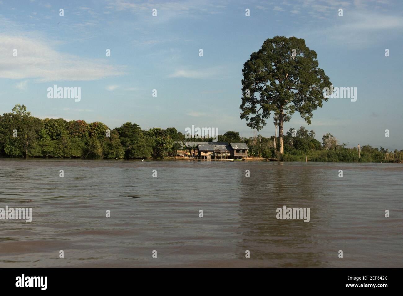 Houses on the side of Mahakam river in East Kalimantan province ...