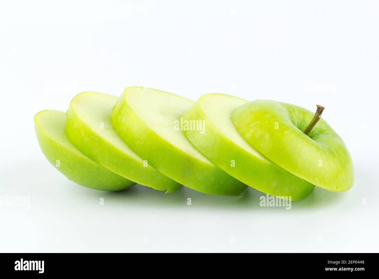 Close up green apple sliced isolated on white background Stock Photo ...
