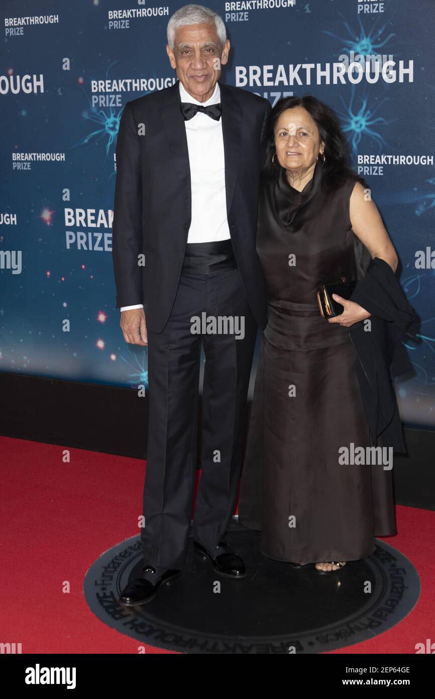 Vinod Khosla (L) and his wife Neeru Khosla (R) attend the eighth annual ...