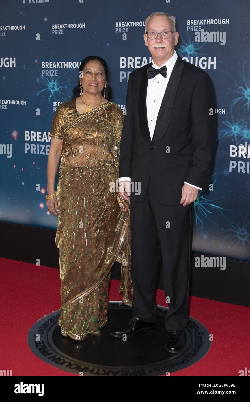 Manajit Hayer-Hartl (L) and Dr. F. Ulrich Hartl attend the eighth ...
