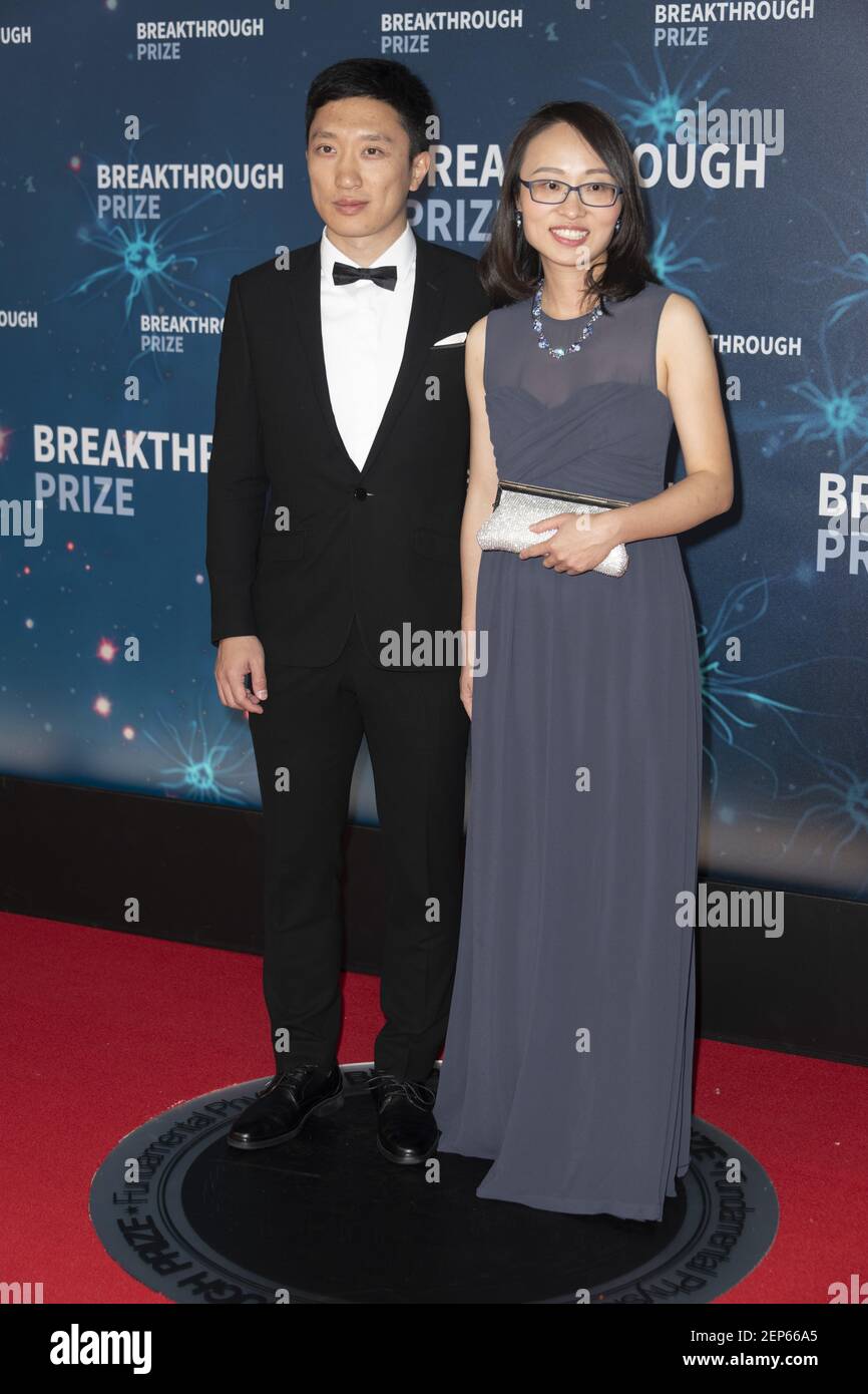 Xie Chen (R) and a guest attends the eighth annual Breakthrough Prize – the “Oscars of Science ...