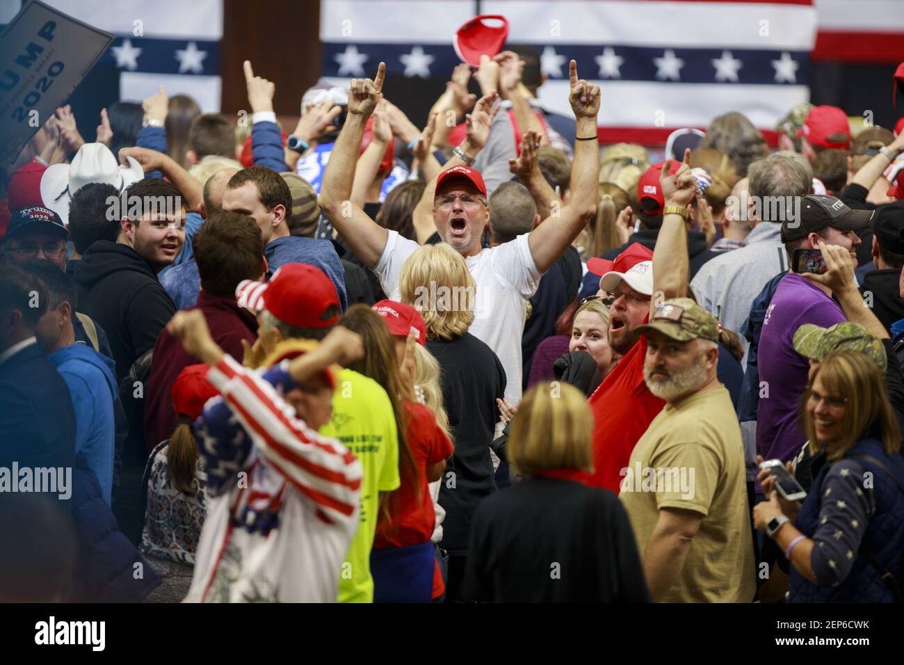 Trump supporters chant slogans while making gestures during a Keep ...