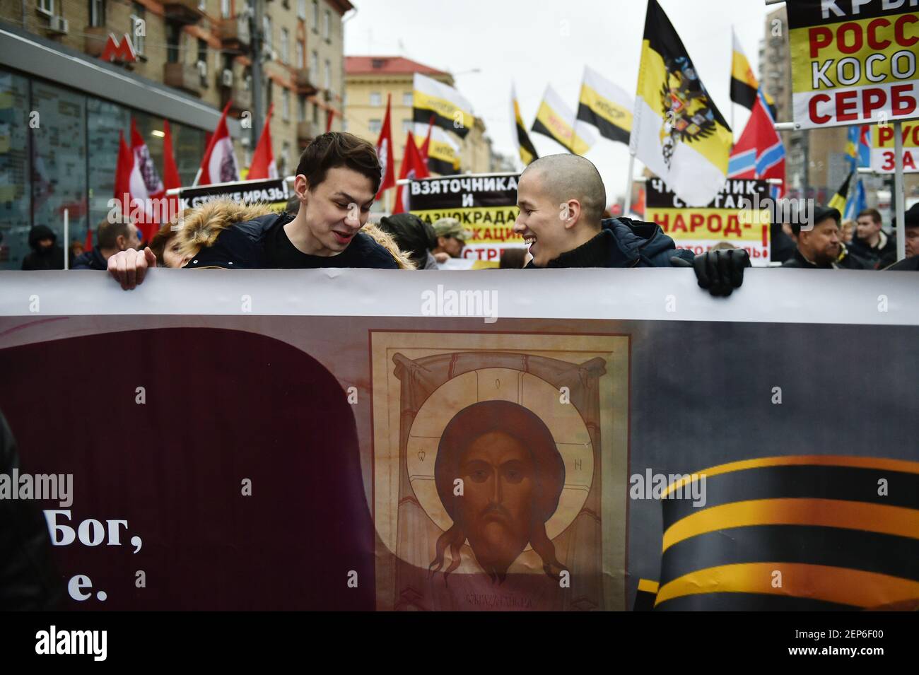 Participants of the "Russian March" nationalists rally during a ...