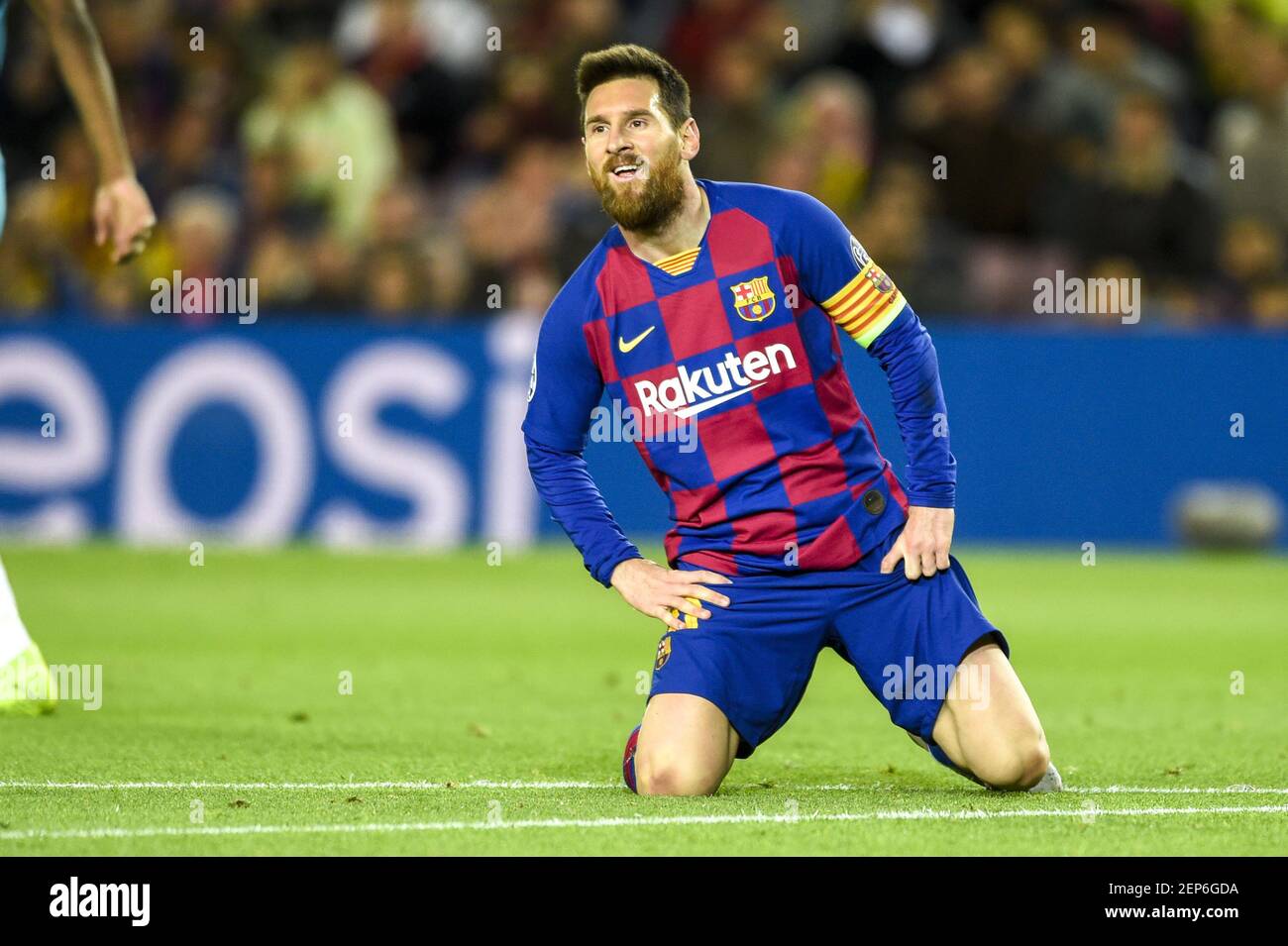Lionel Messi of Barcelona kneeling on the pitch during the UEFA ...