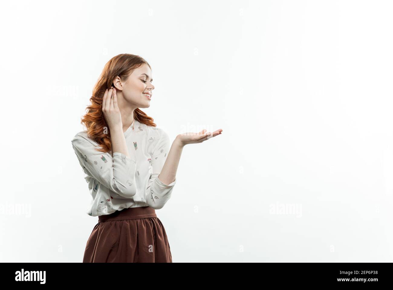 elegant woman in suit holds her hand in front of her Copy Space Stock ...