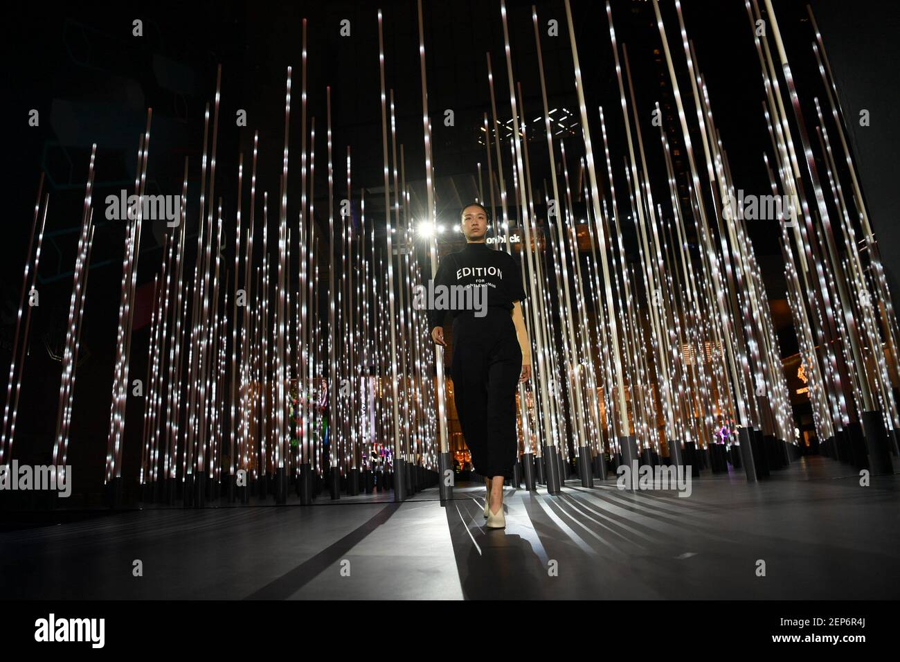 A model catwalks through the Hexatron at the Chengdu International ...
