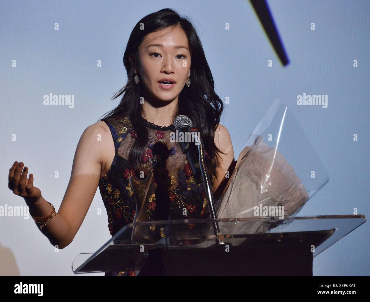 Snow Leopard Rising Star Award Honoree Tiffany Chu speaking at the 5th ...