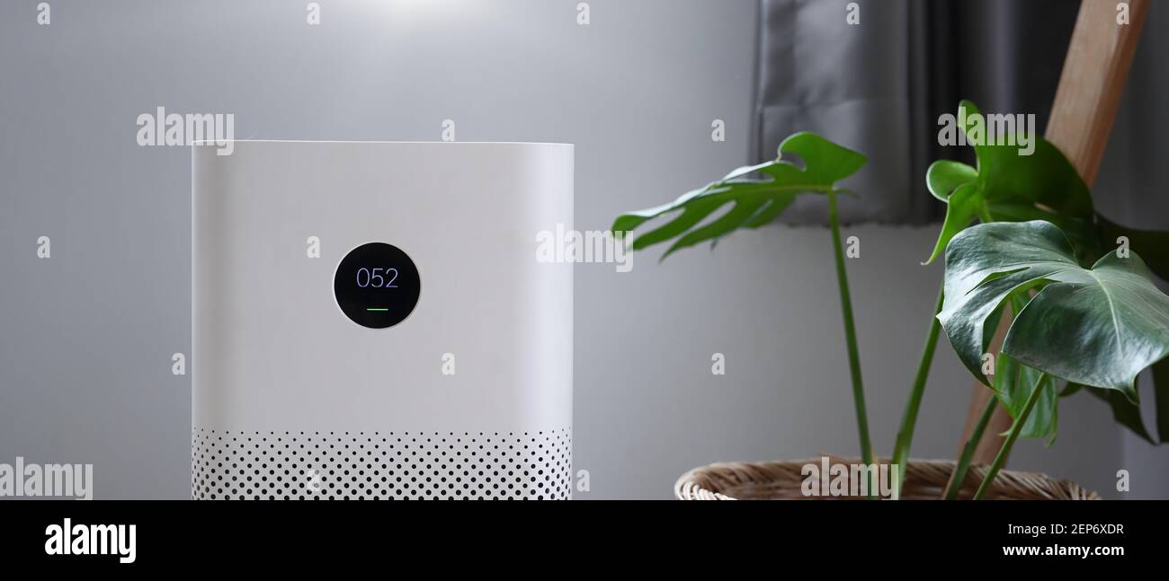 Air purifier with digital monitor screen in bedroom for show air ...