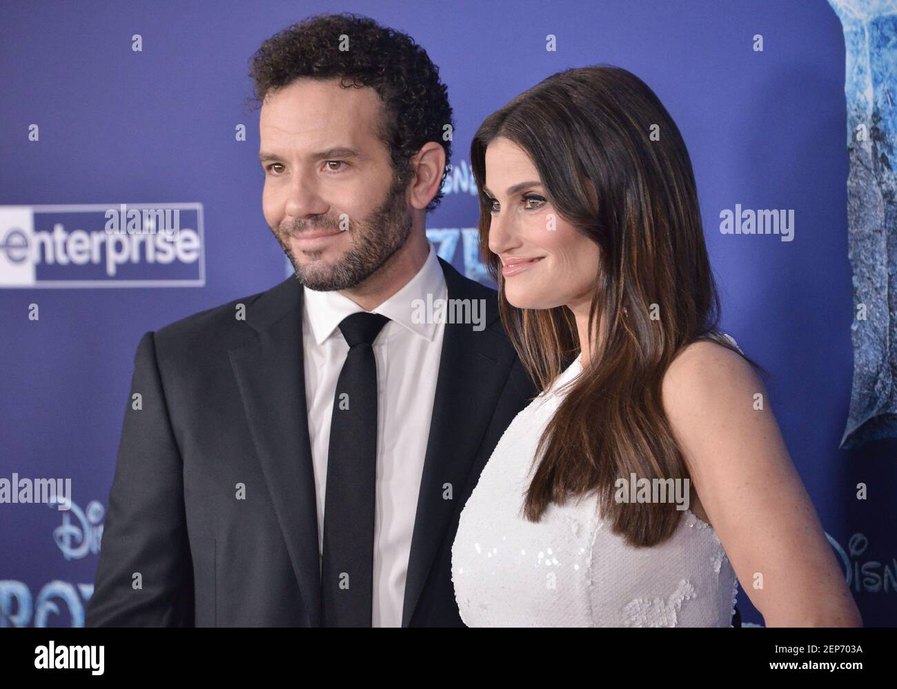(L-R) Aaron Lohr and Idina Menzel arrives at Disney's FROZEN 2 World ...