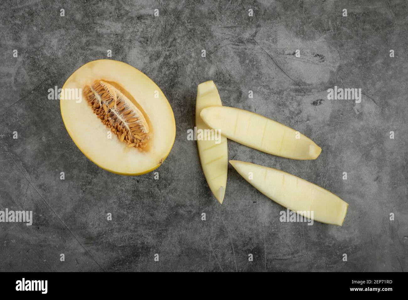Set of fresh sweet melon placed on marble surface Stock Photo - Alamy