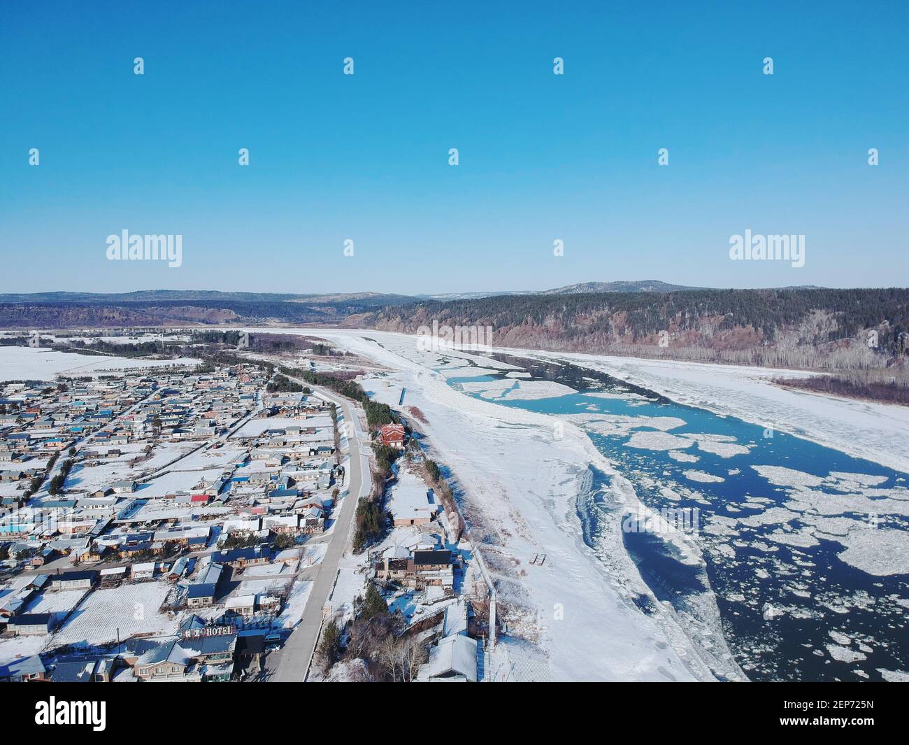 An aerial view of various ice with different shapes and areas floating ...
