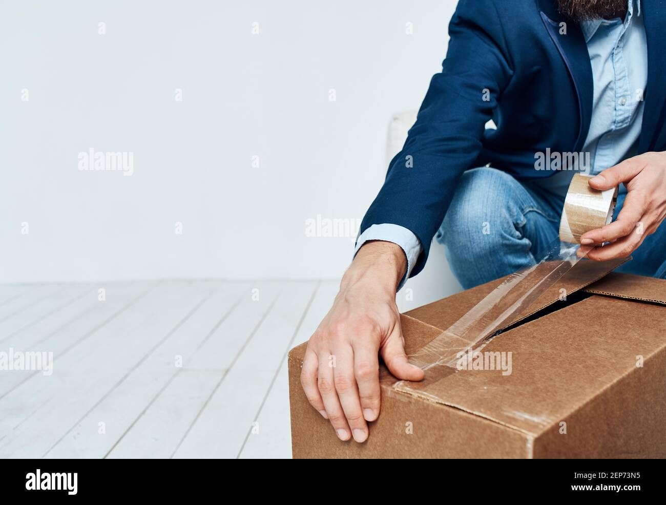 Business man pack in boxes office manager official Stock Photo - Alamy