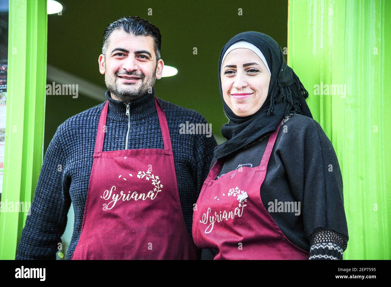 Syrian-born shop owners Yasser Kannan and his wife Dema Yasser pose for ...