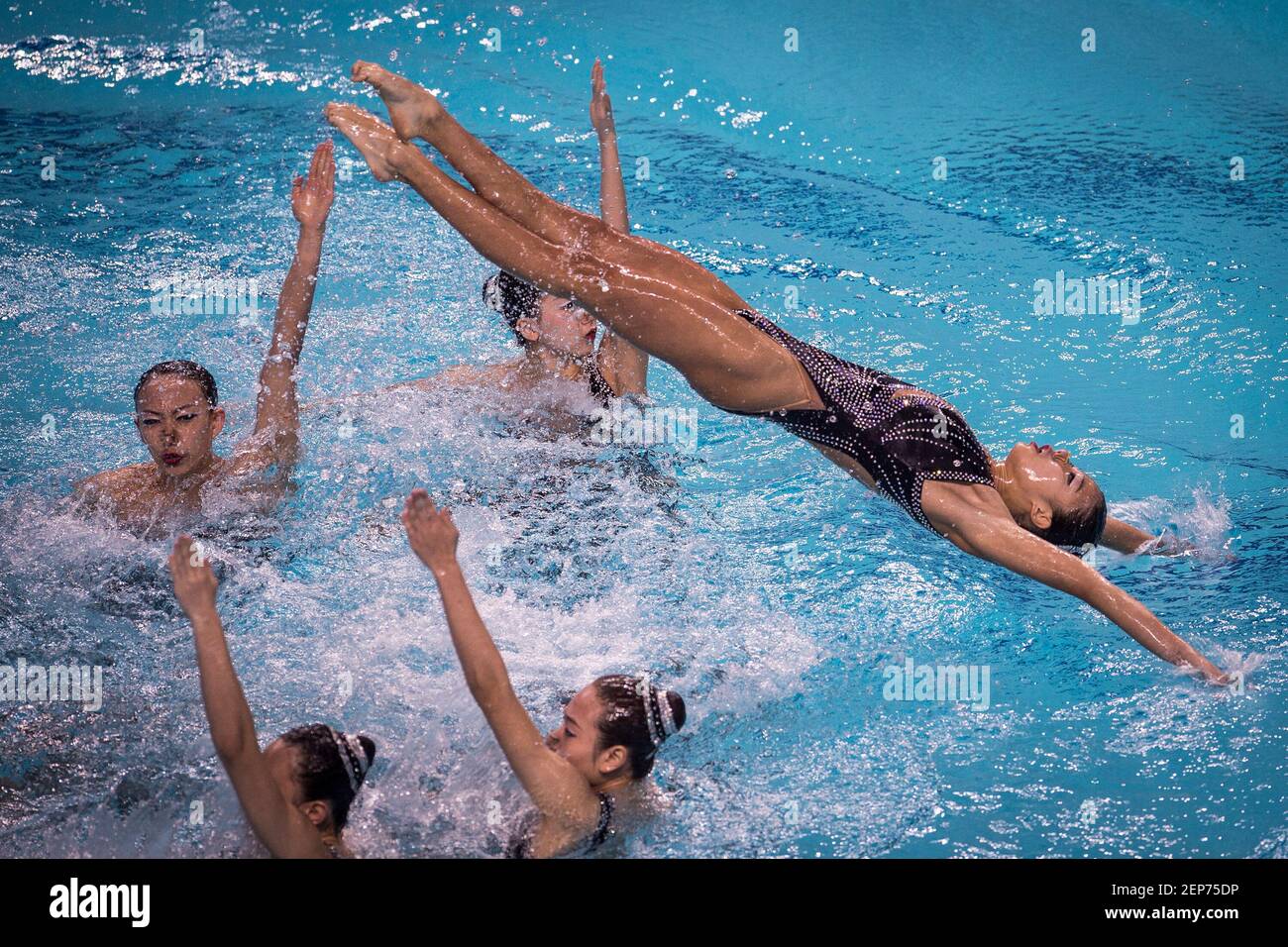 Swimmers do water ballet at the free combination synchronized swimming ...