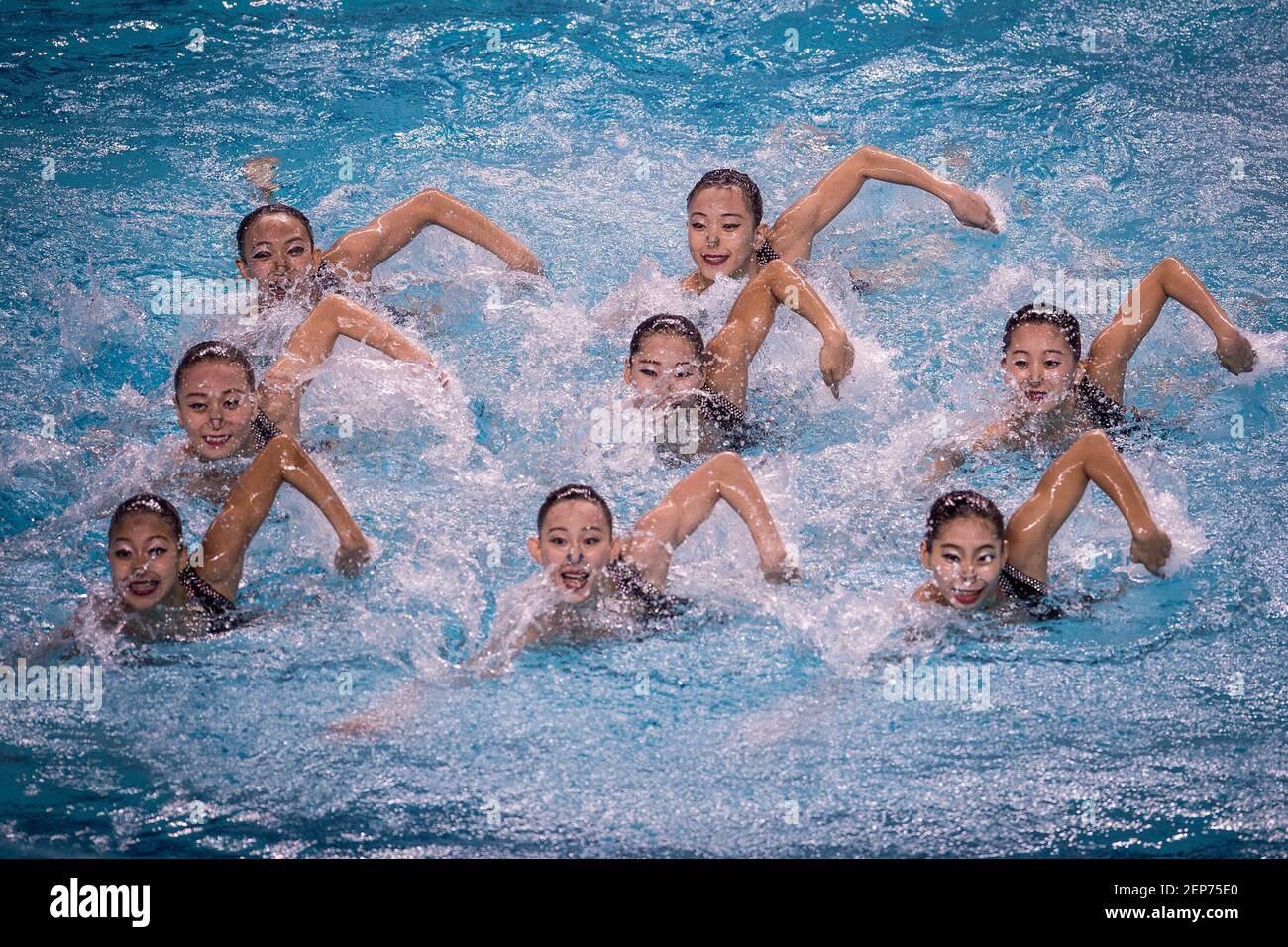 Swimmers do water ballet at the free combination synchronized swimming ...
