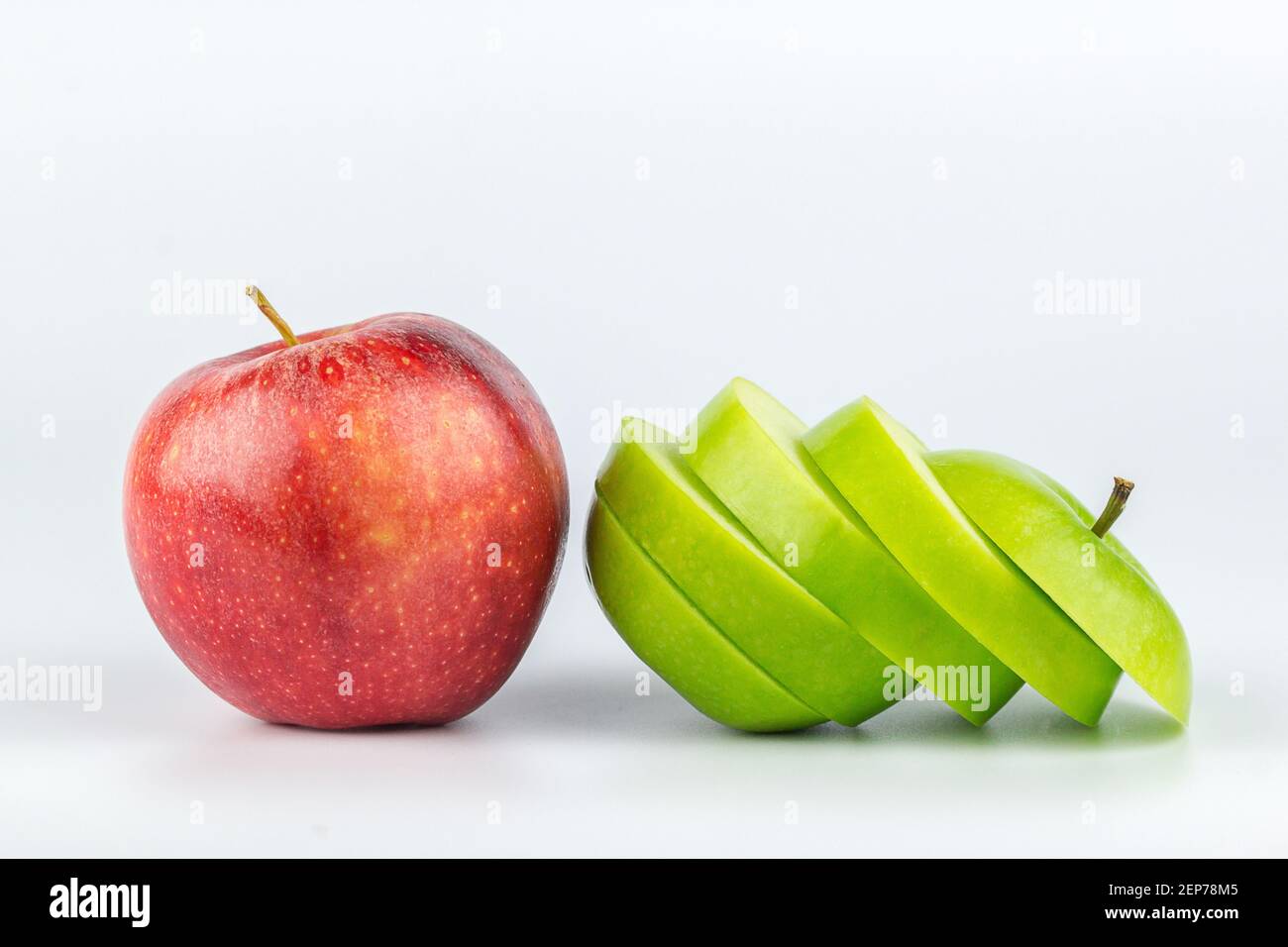 Whole red and green apple fruit with slice (cut) isolated on white ...