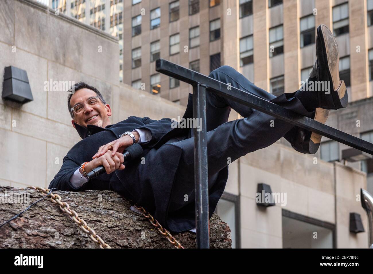 WNBC meteorologist David Price poses on top of the 2019 Rockefeller ...