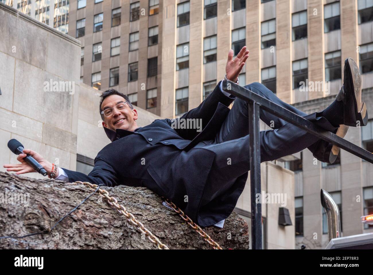 WNBC meteorologist David Price poses on top of the 2019 Rockefeller ...