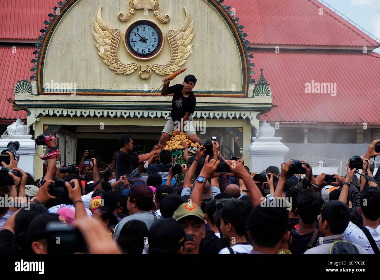 Javanese Moslem arrange over 'Gunungan' during the Grebeg Mulud ...