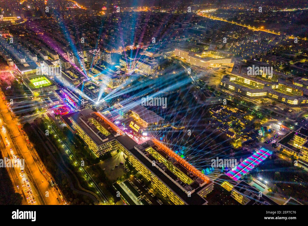 An aerial view of colorful lights switched on in Alibaba headquarters ...