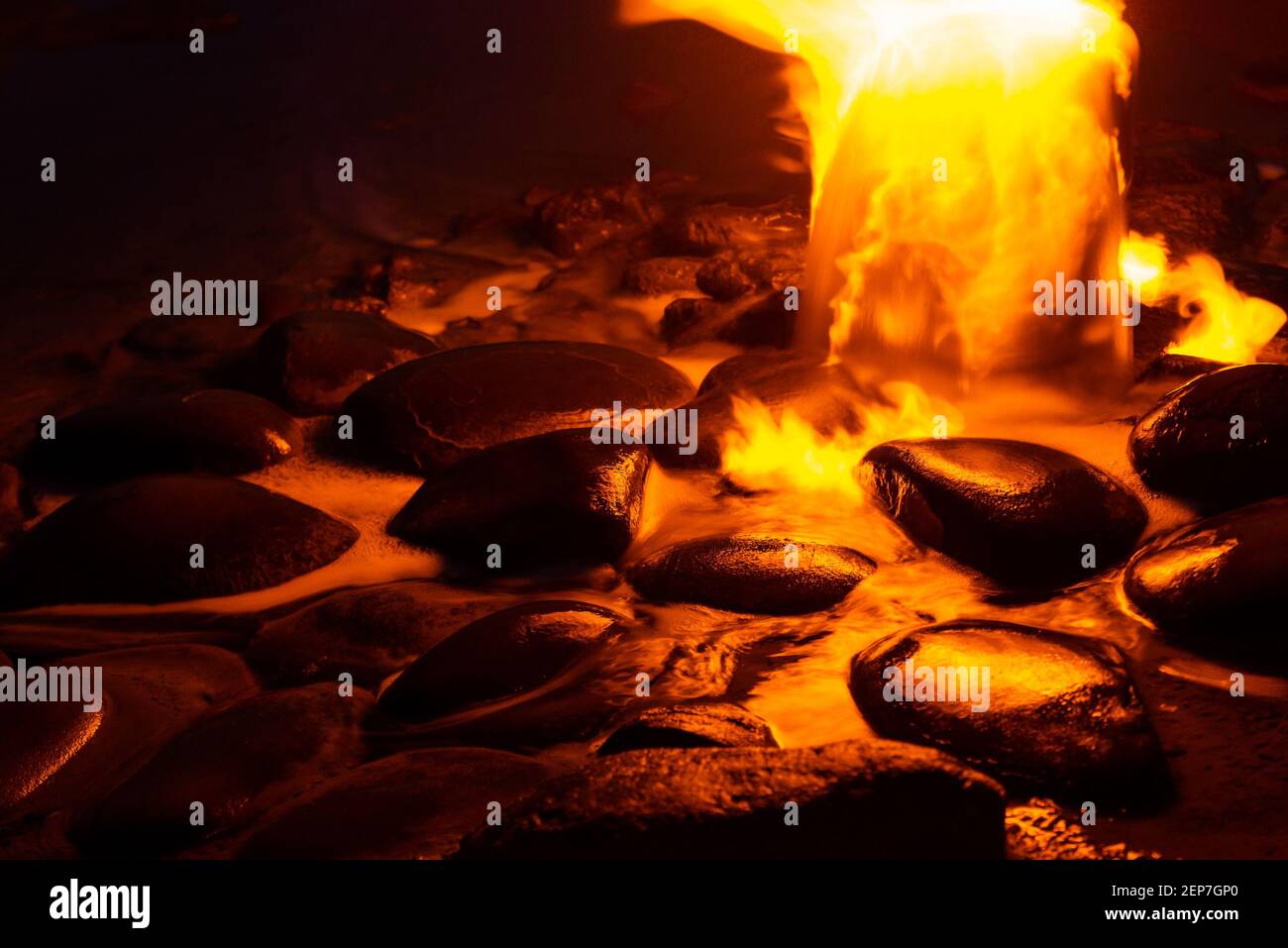Spring of fire water. Burning methane in water. Cold fire Stock Photo ...