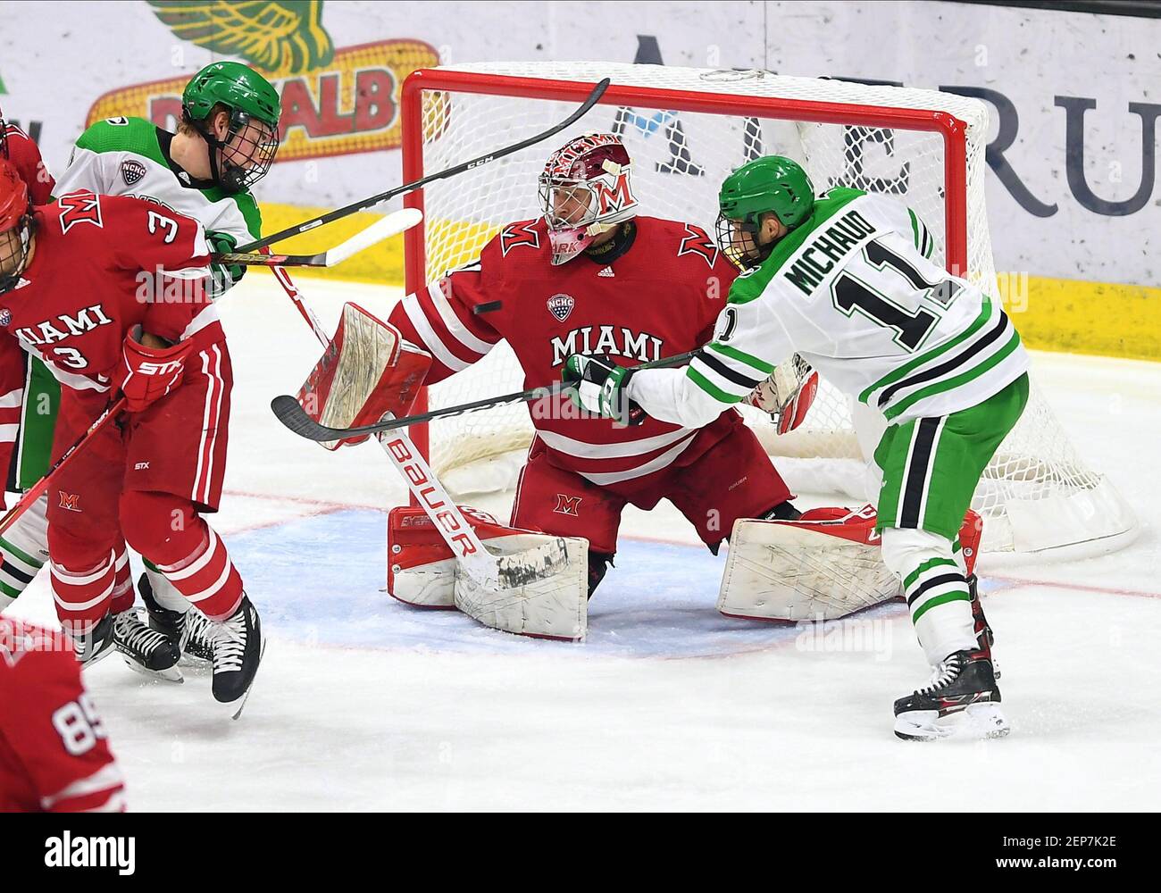 November 9, 2019 North Dakota Fighting Hawks forward Westin Michaud (11) reaches to deflect a ...