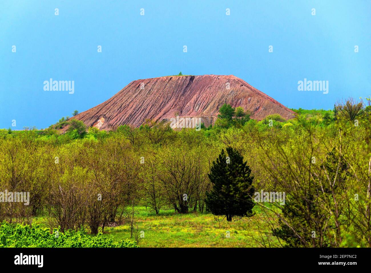 View of slag heaps of iron ore quarry. Mining industry Stock Photo - Alamy