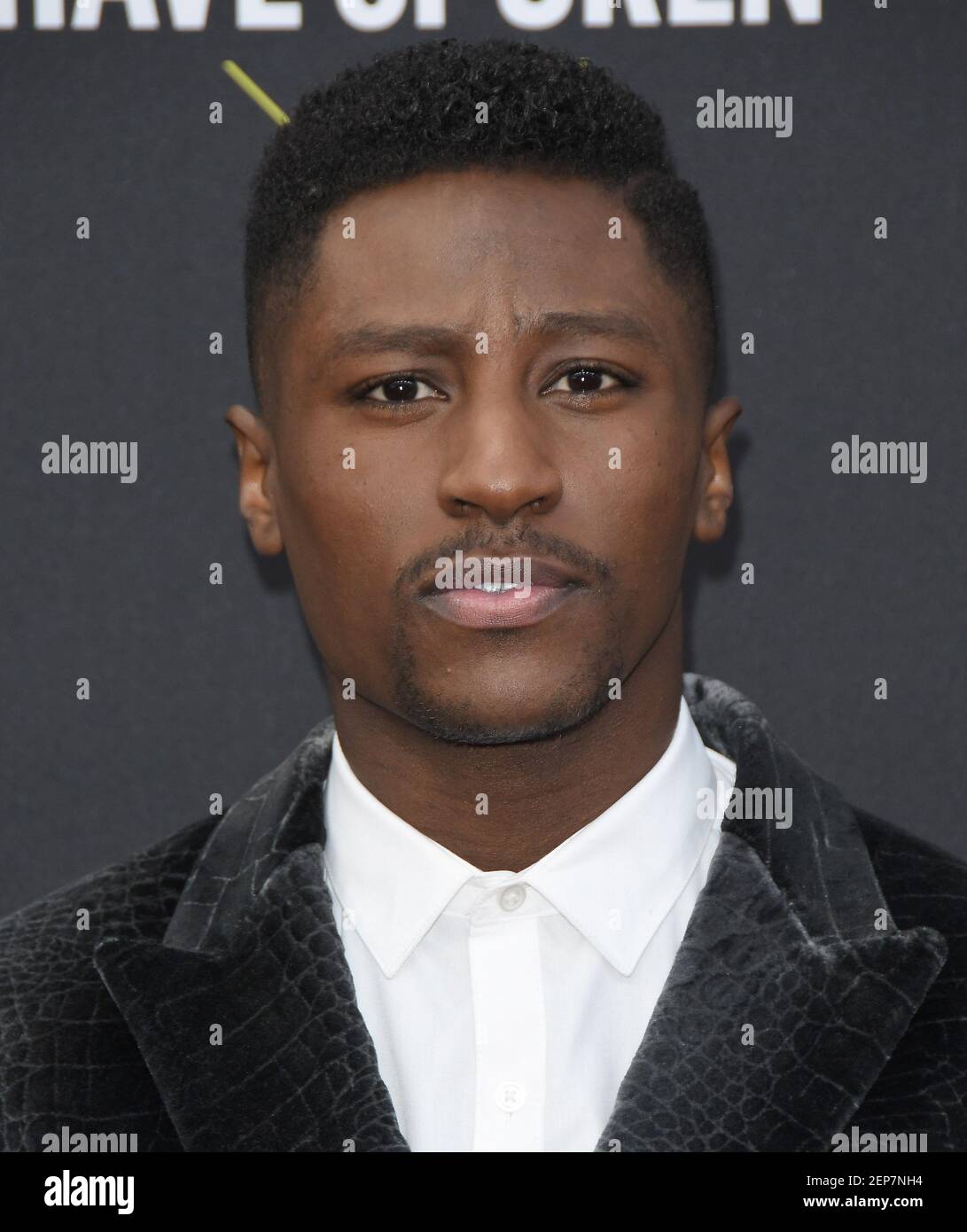 Joseph David-Jones arrives at the 2019 E! People’s Choice Awards held ...