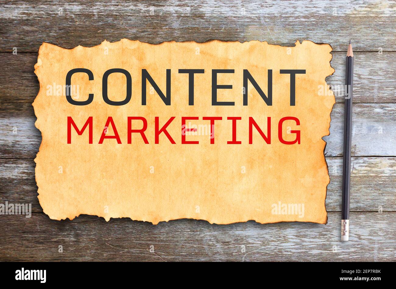 Business concept with text CONTENT MARKETING on old paper and pencil on ...