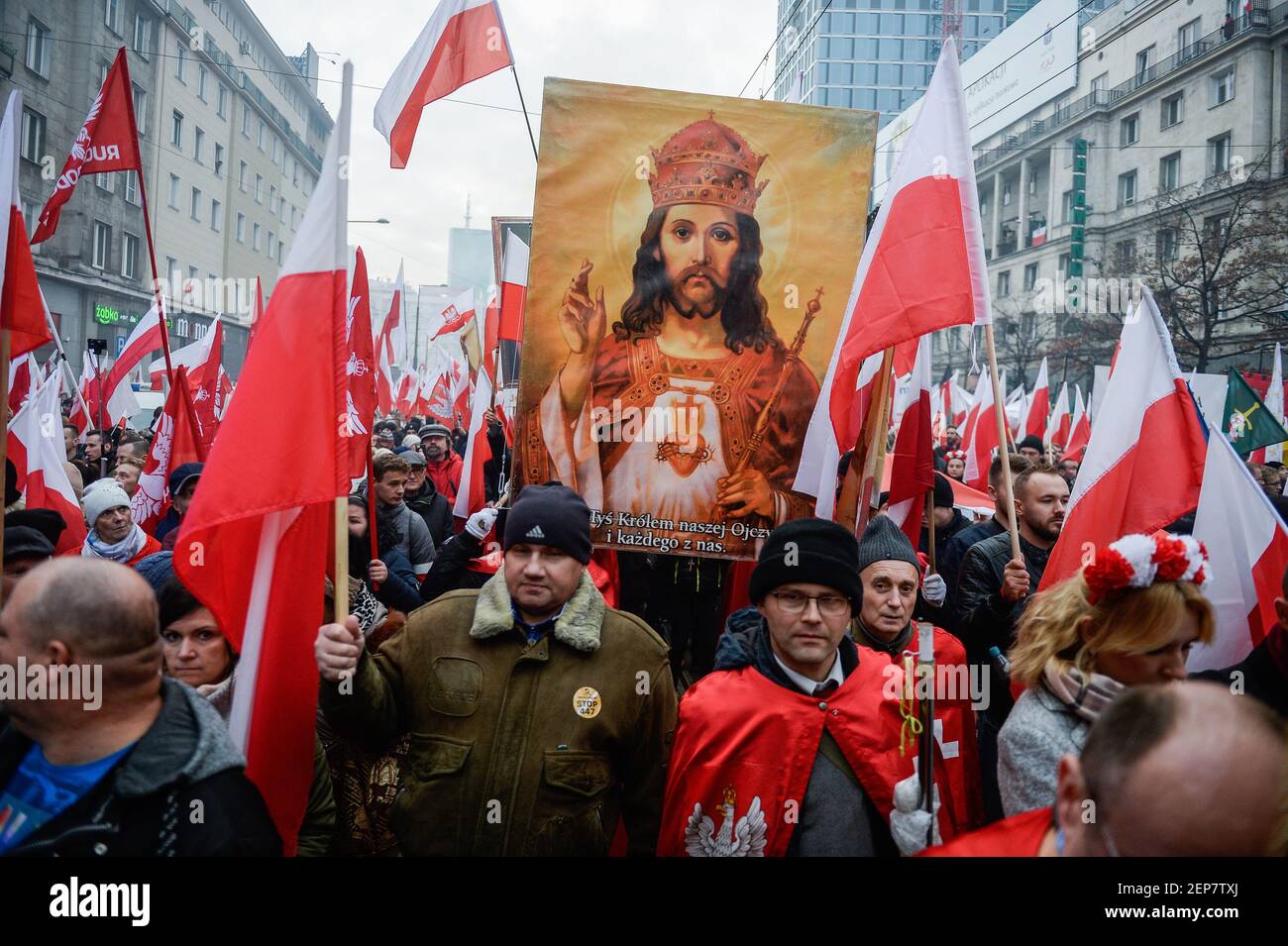Members of catholic conservative associations hold a banner with Jesus ...