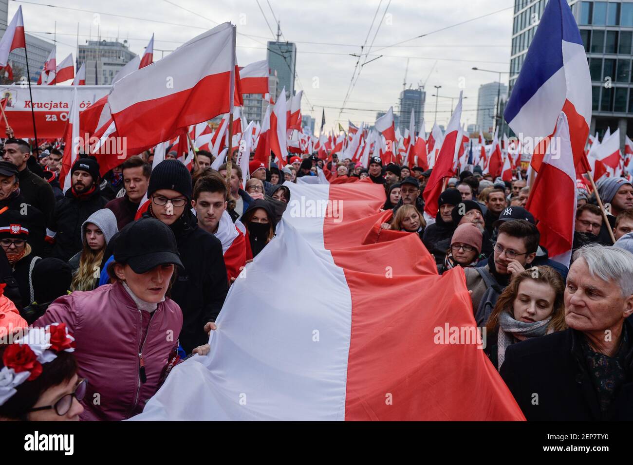 People hold polish flags during the independence march of the 101st ...