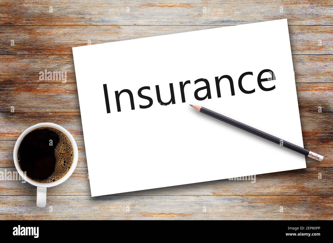 Insurance text on white paper,notepad or notebook with black pencil and ...