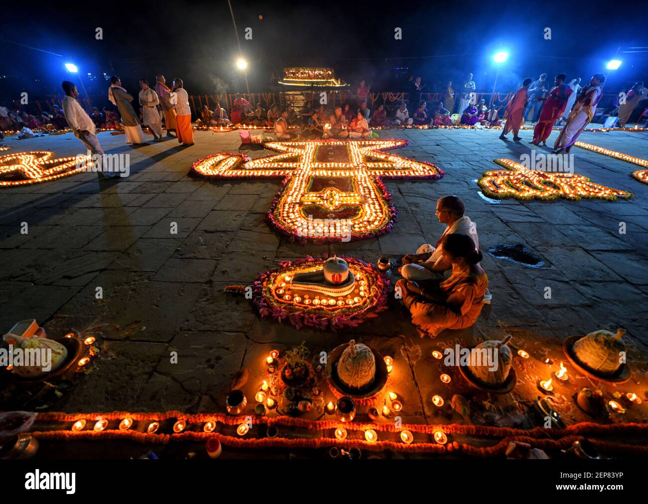 Indian Hindu devotees light Lamps while Praying to God on the eve of ...